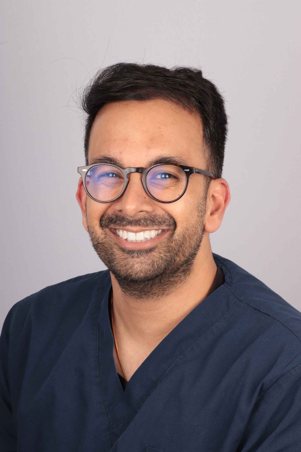 Dr Ashish Gohil - Dentist | About Smiles Dental Clinic